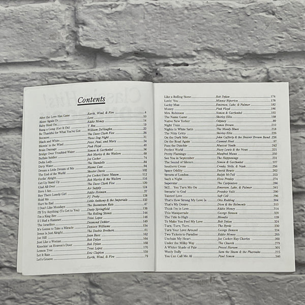 Amsco The Library of Classic Hits! Guitar/Piano/Vocal Book - Evolution ...