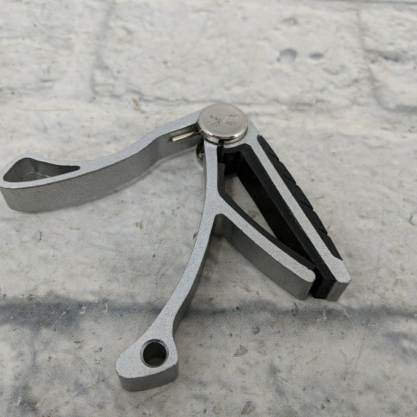 First Act Silver Clamp Style Capo - Evolution Music
